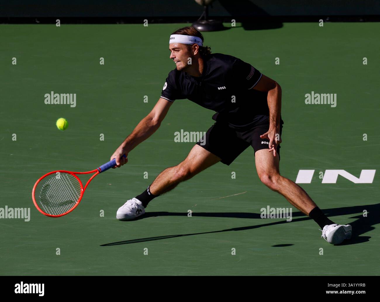 March 10, 2025 Taylor Fritz returns a shot against Alejandro Tabilo (CHI) during the 2025 BNP ...