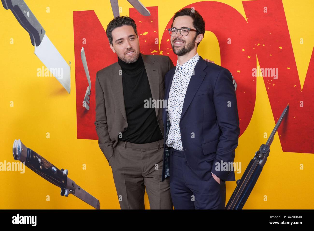 Dan Berk, left, and Robert Olsen arrive at the premiere of "Novocaine ...