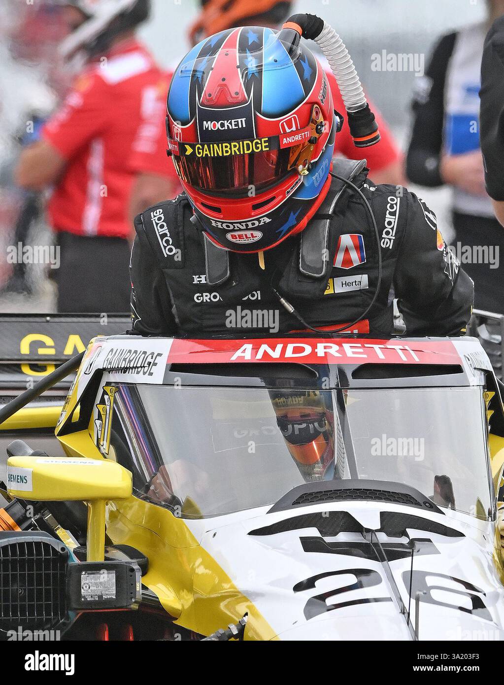 IndCar driver Colton Herta slides into the cockpit of the #26 Andretti ...