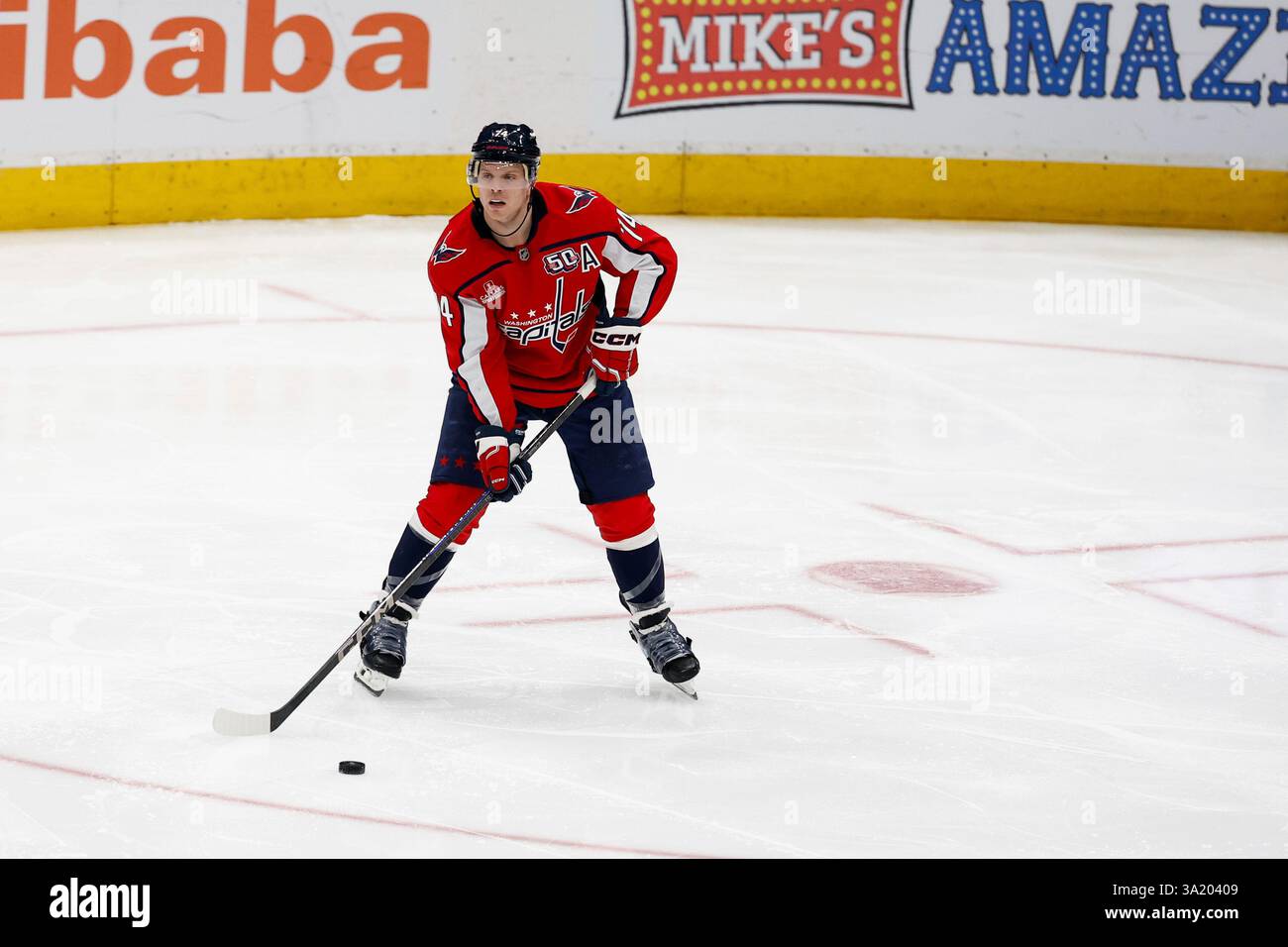 Washington Capitals defenseman John Carlson (74) handles the puck ...