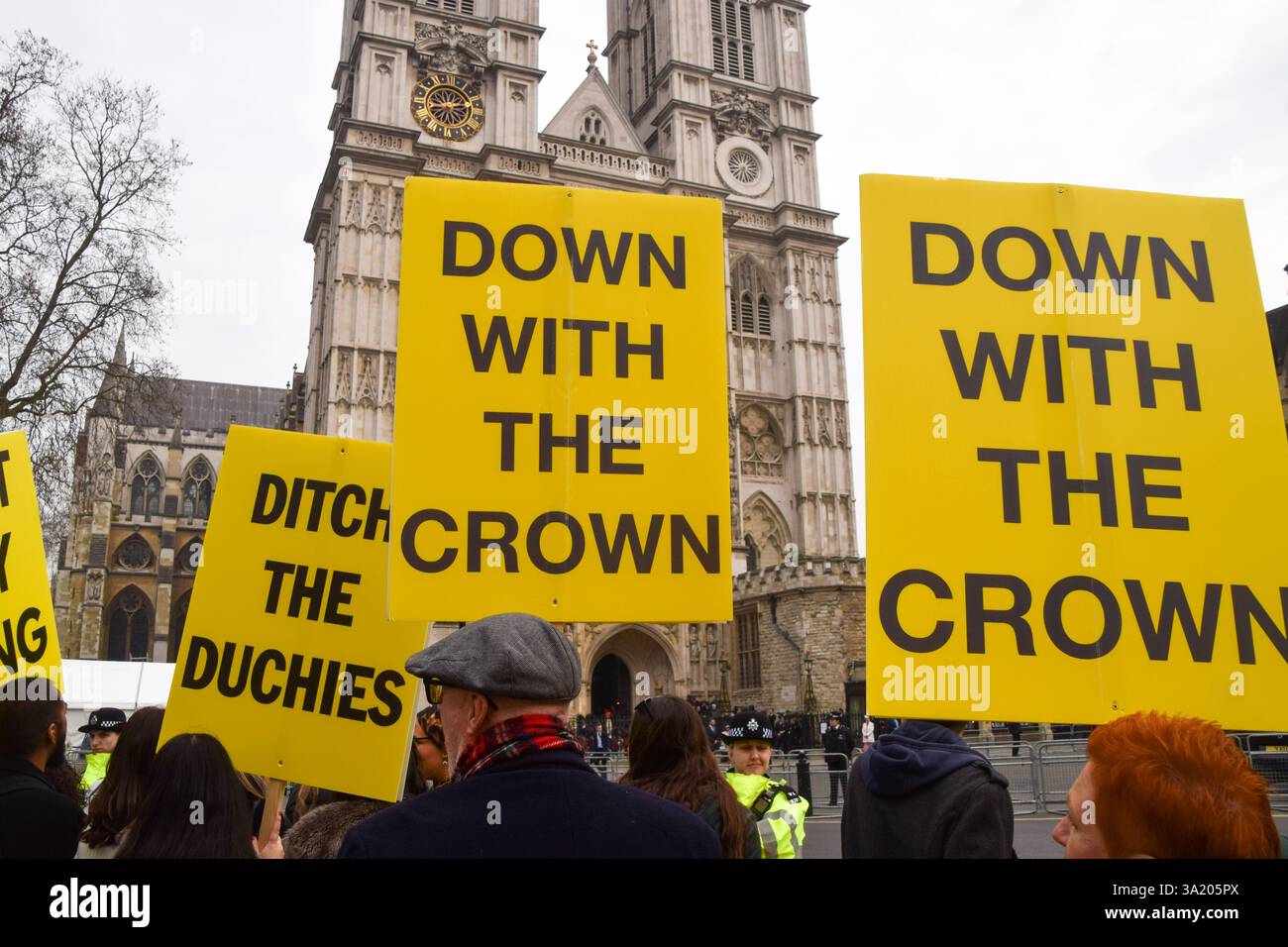 London, UK. 10th Mar, 2025. Protesters hold 'Down with the crown ...