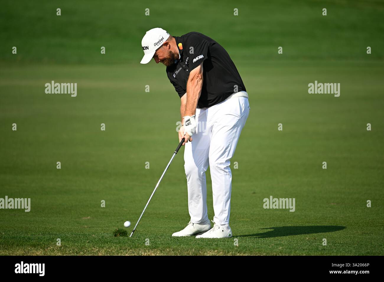 Shane Lowry, of Ireland, hits from the 16th fairway during the final ...