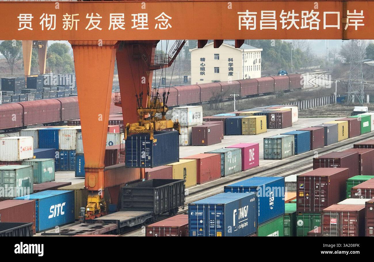 NANCHANG, CHINA - MARCH 6, 2025 - A gantry crane lifts containers ...