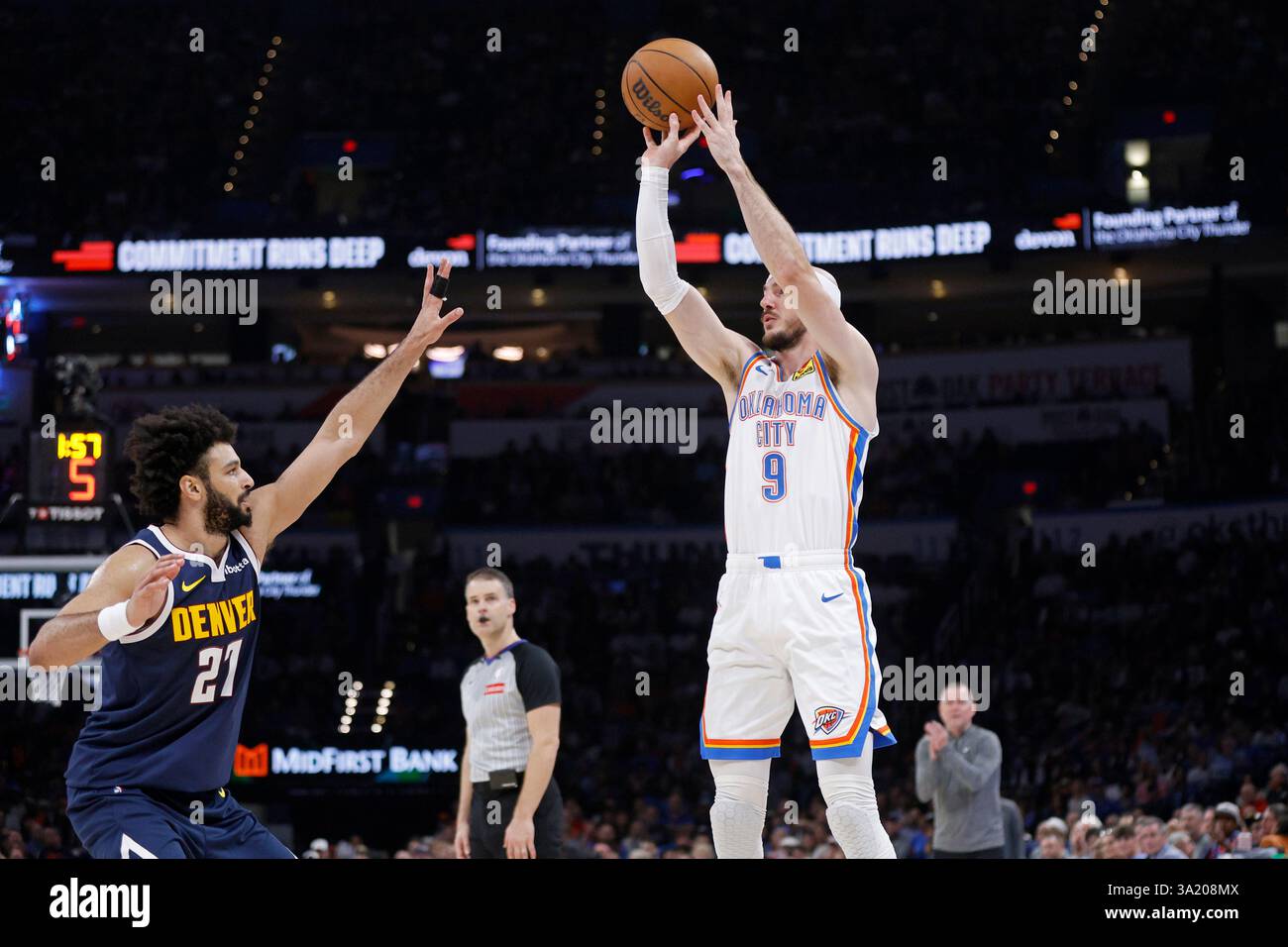 Oklahoma City Thunder guard Alex Caruso (9) looks to shoot over Denver ...