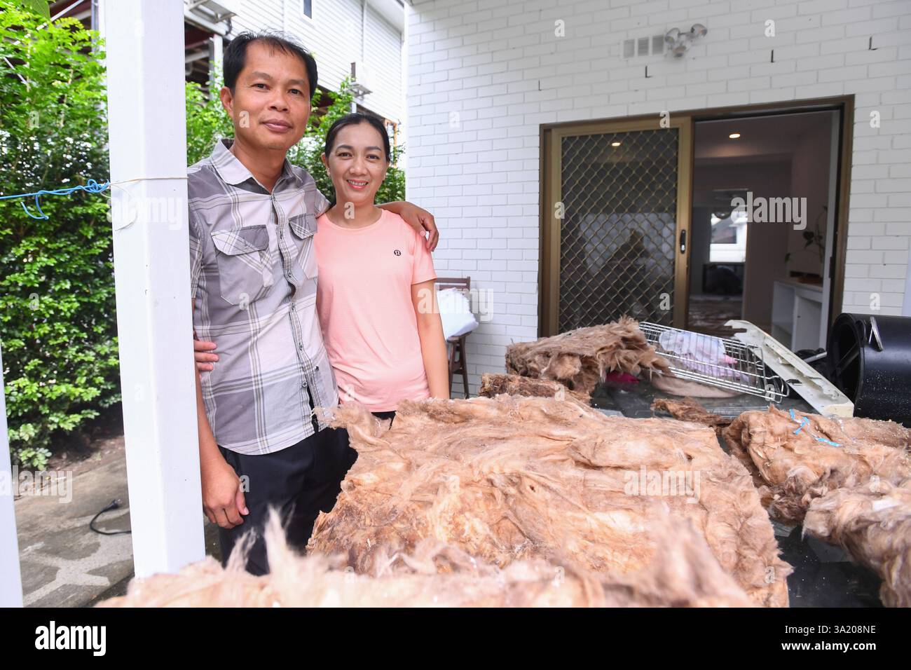 Brisbane, Australia. 11th Mar, 2025. Quang Phan and wife Chu Ma, pose ...