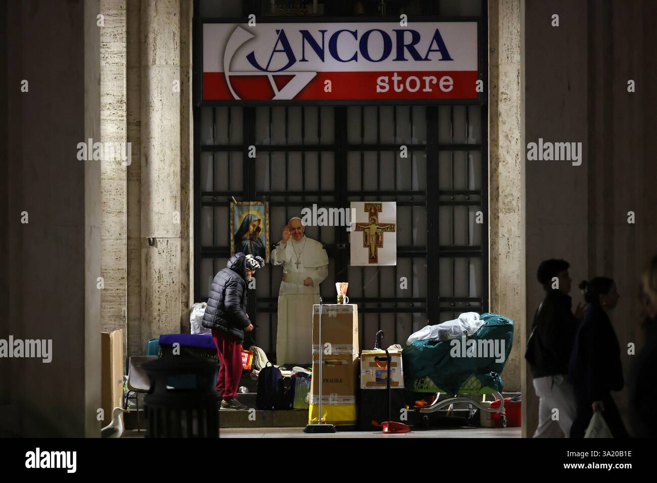 Vatican City, Italy. 08th Mar, 2025. Homeless man cleans the floor ...