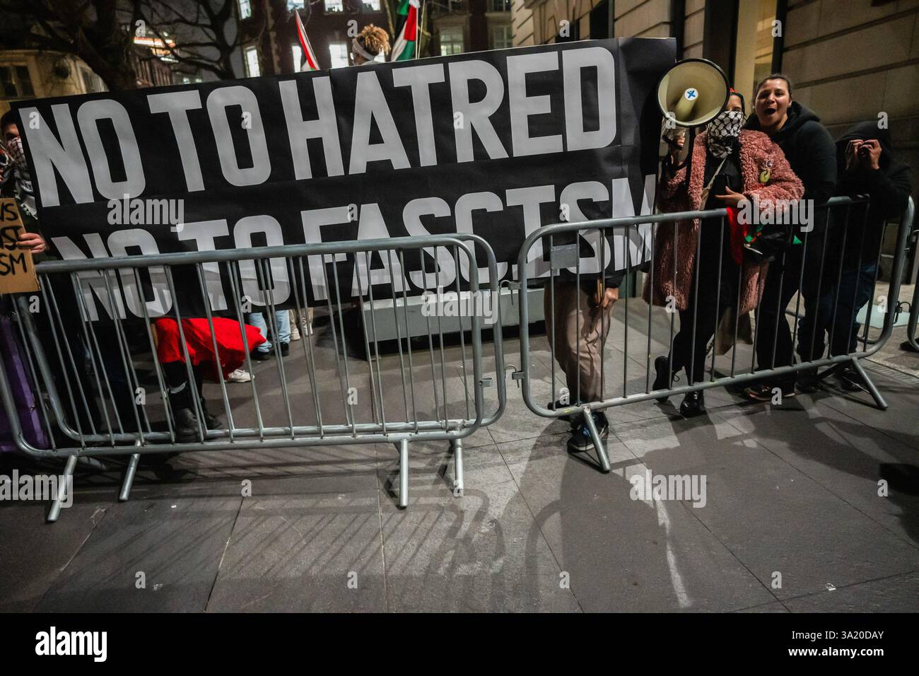 London, UK. 10th Mar, 2025. A cordon corridor separated pro-Palestinian ...