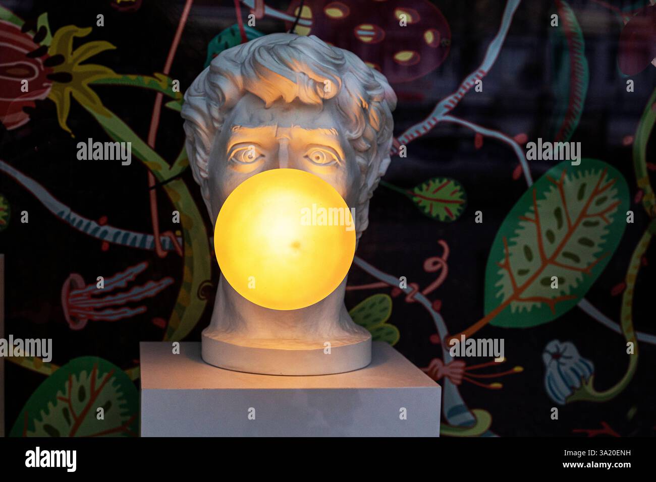 stylish lamps in the form of inflatable balloons on antique heads ...