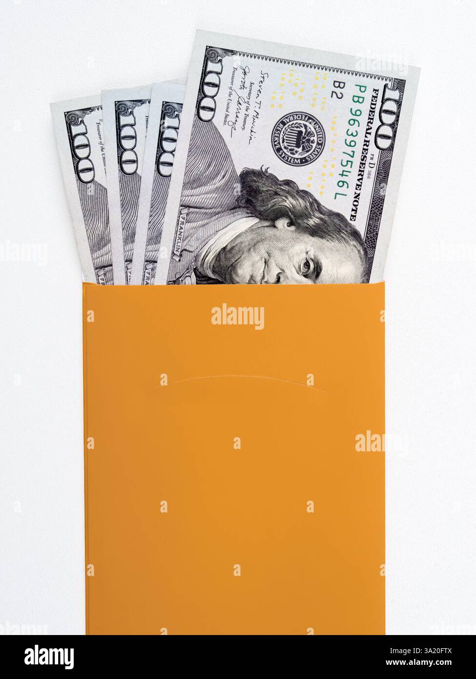 One hundred dollars bill banknote cash with Benjamin Franklin's face ...