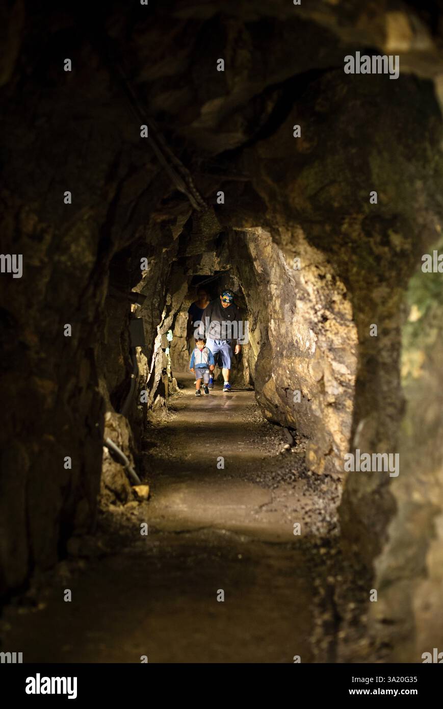 Ryosuke Tanaka, 2, and his father Keisuke, 32, and mother Asami walk ...