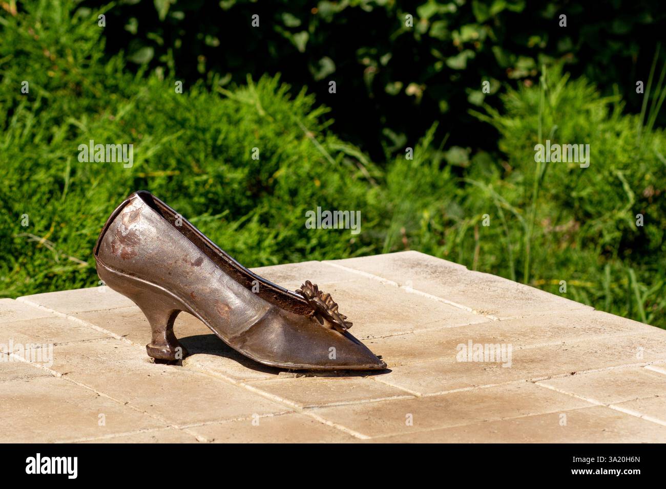 Maykop ,Russia - 02 June 2024: Cinderella shoe sculpture in main park ...