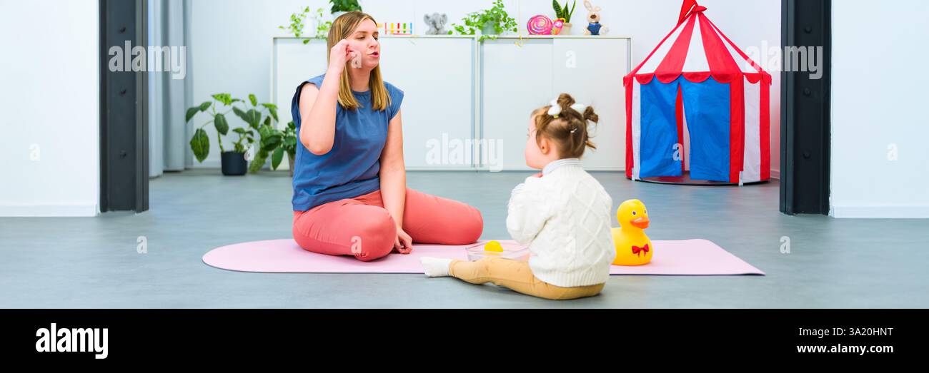 Nonverbal child with Down syndrome learning baby sign language with the ...