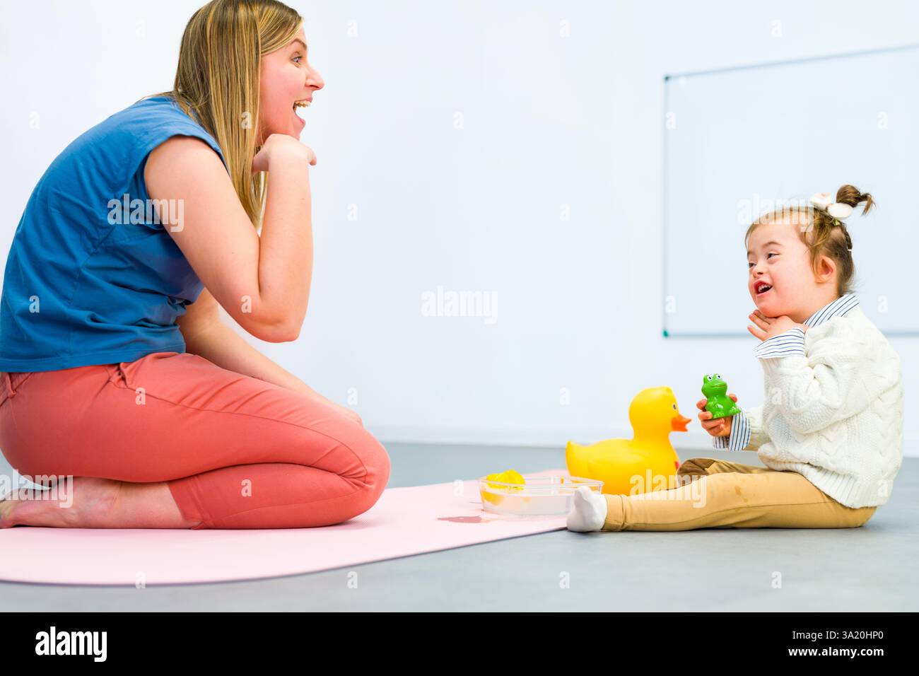 Nonverbal child with Down syndrome learning baby sign language with the ...