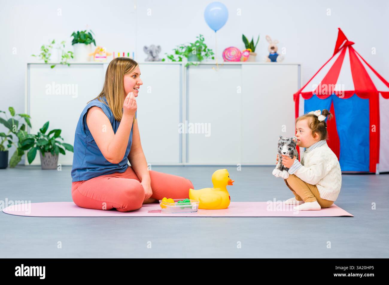 Nonverbal child with Down syndrome learning baby sign language with the ...
