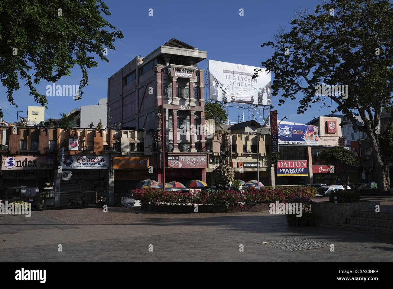 Urban buildings near Davao City Hall, highlighting commercial and ...