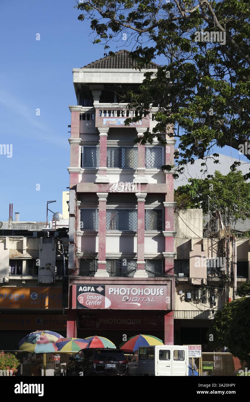 Urban buildings near Davao City Hall, highlighting commercial and ...