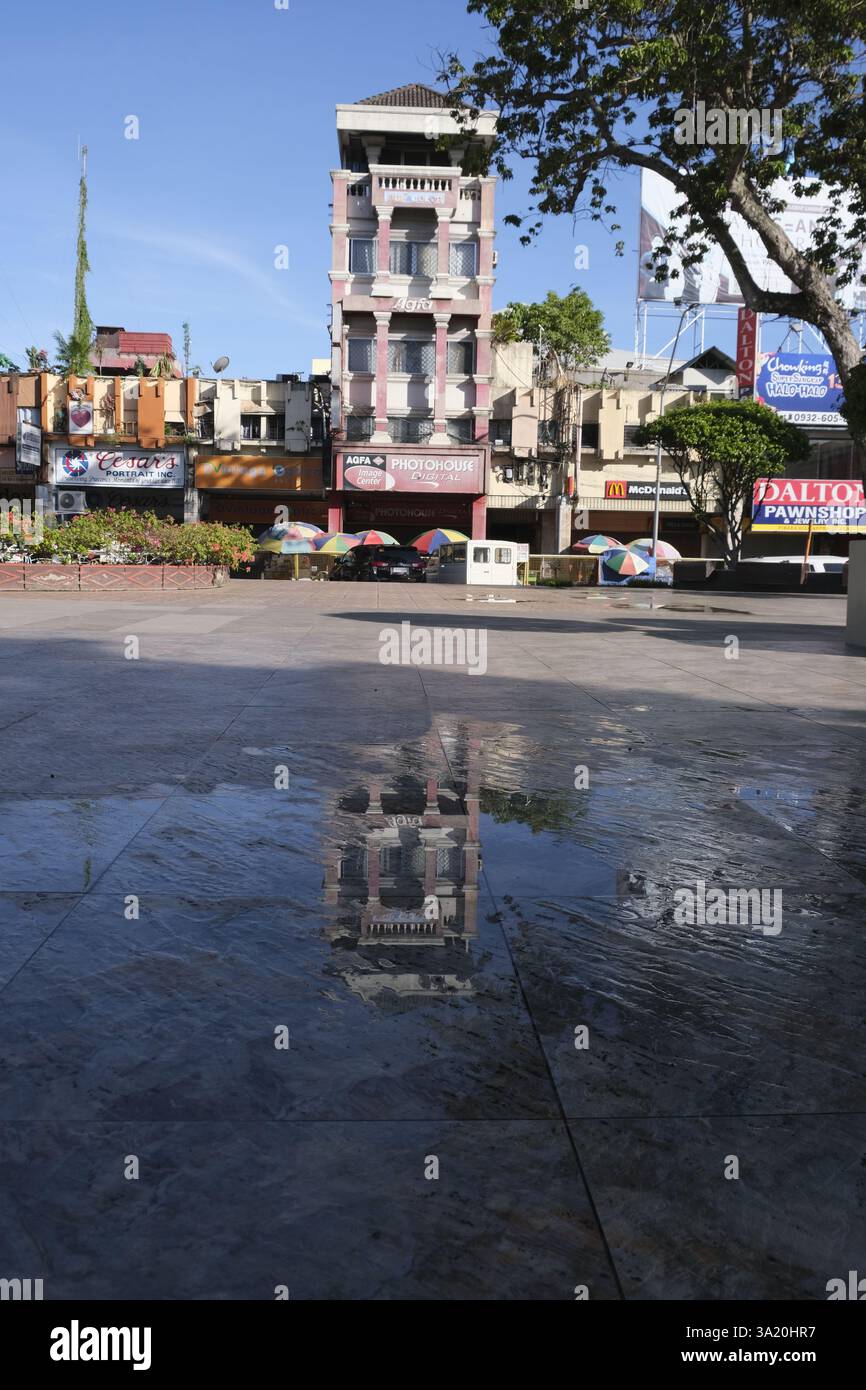 Urban buildings near Davao City Hall, highlighting commercial and ...