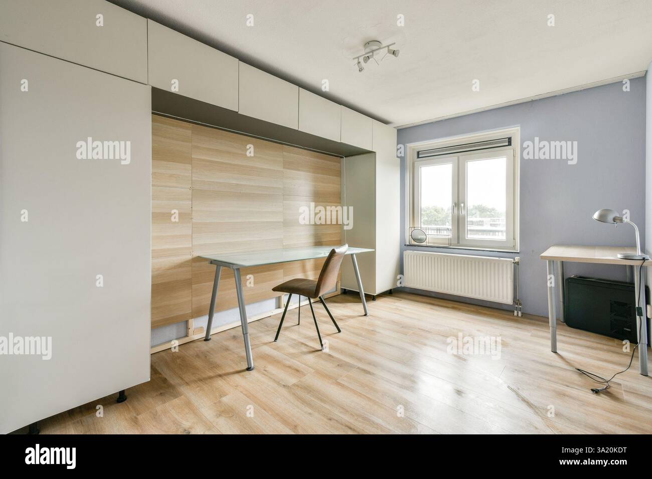 A stylish modern room featuring minimalist design elements, light wood ...