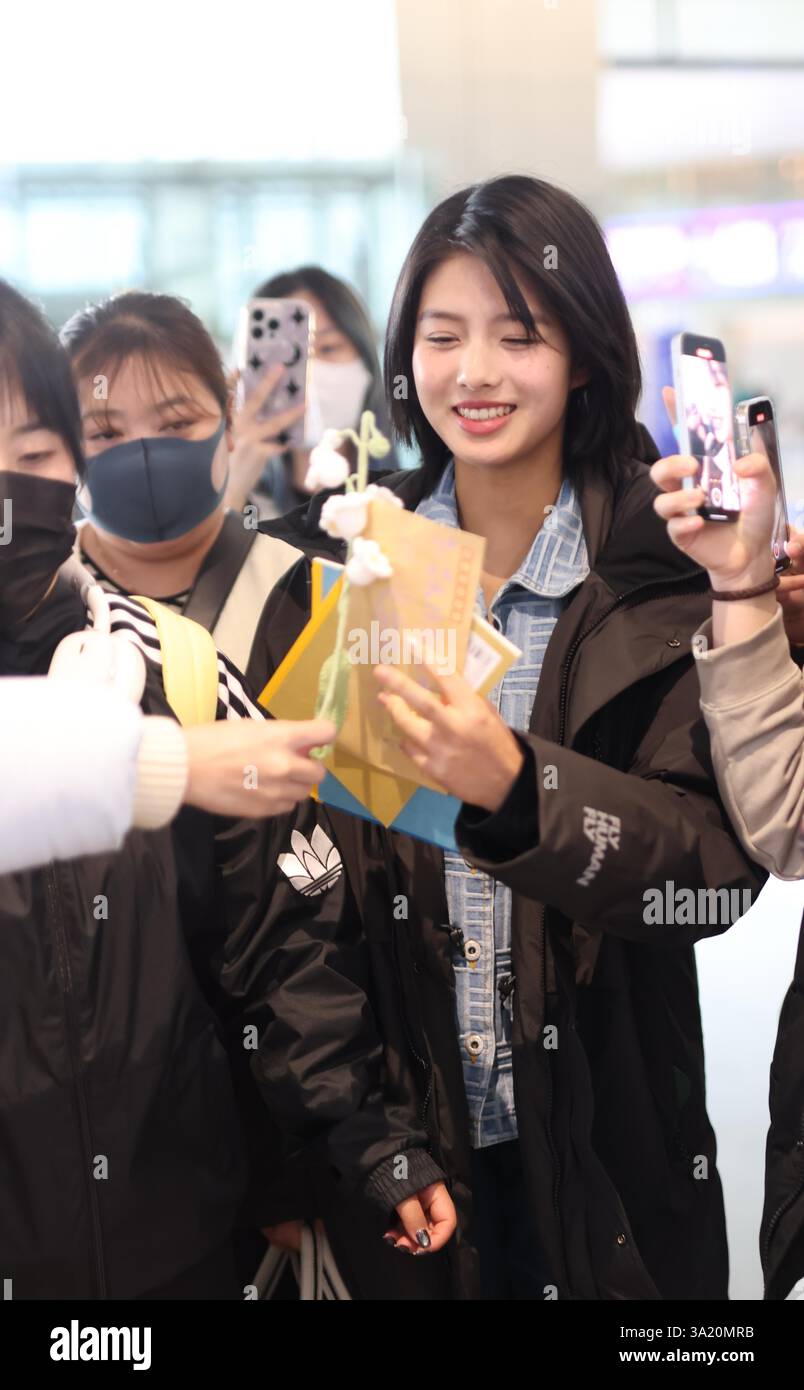 Chinese actress Ai Mi appears at the airport in Shanghai, China, 8 March, 2025 Stock Photo - Alamy