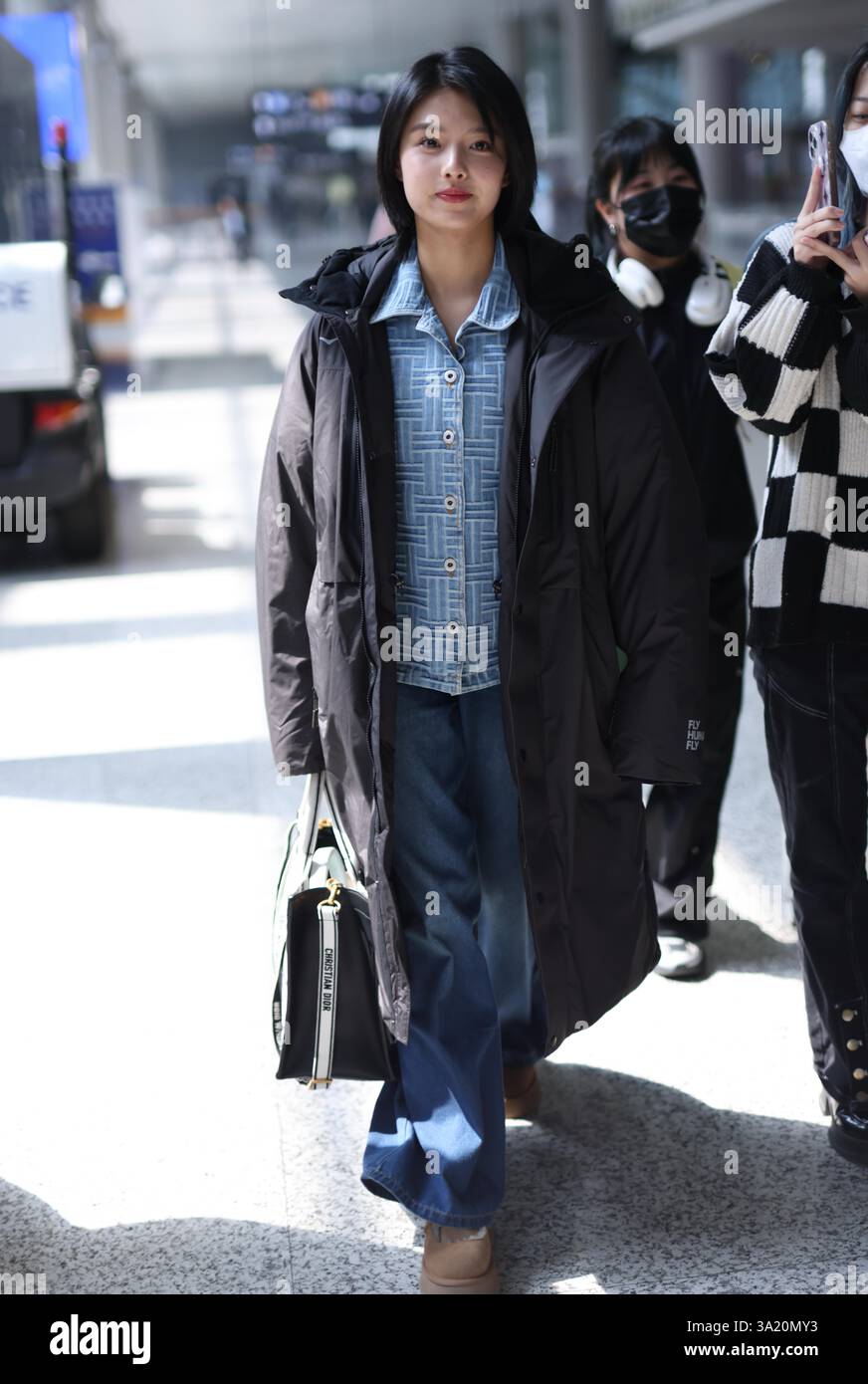 Chinese actress Ai Mi appears at the airport in Shanghai, China, 8 ...