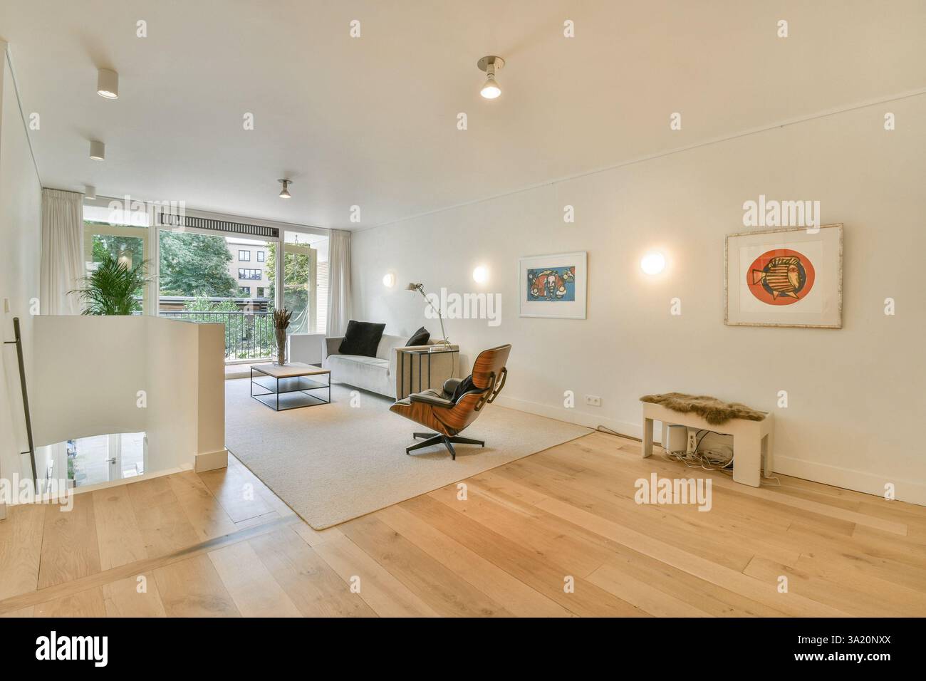 Bright and airy modern interior featuring minimalist furniture, wooden ...
