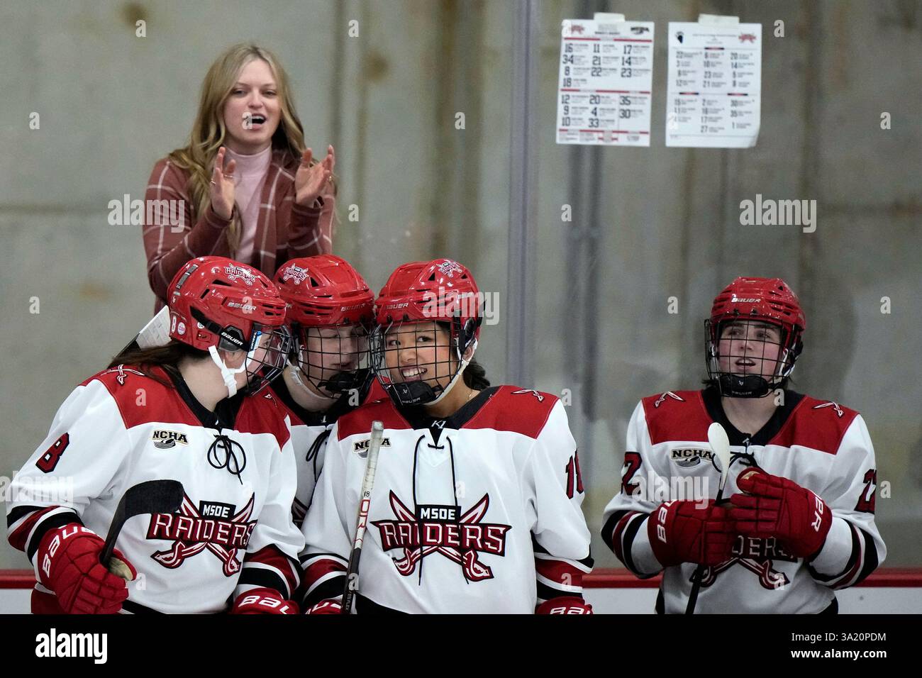 Milwaukee School of Engineering head coach Baylee Marabella, top, claps ...