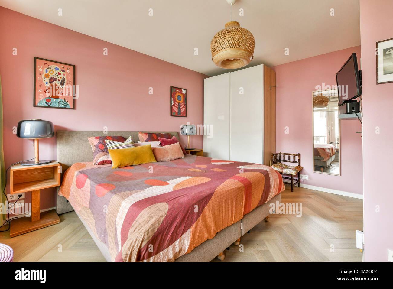 A stylish bedroom featuring warm colors, contemporary furniture, and ...