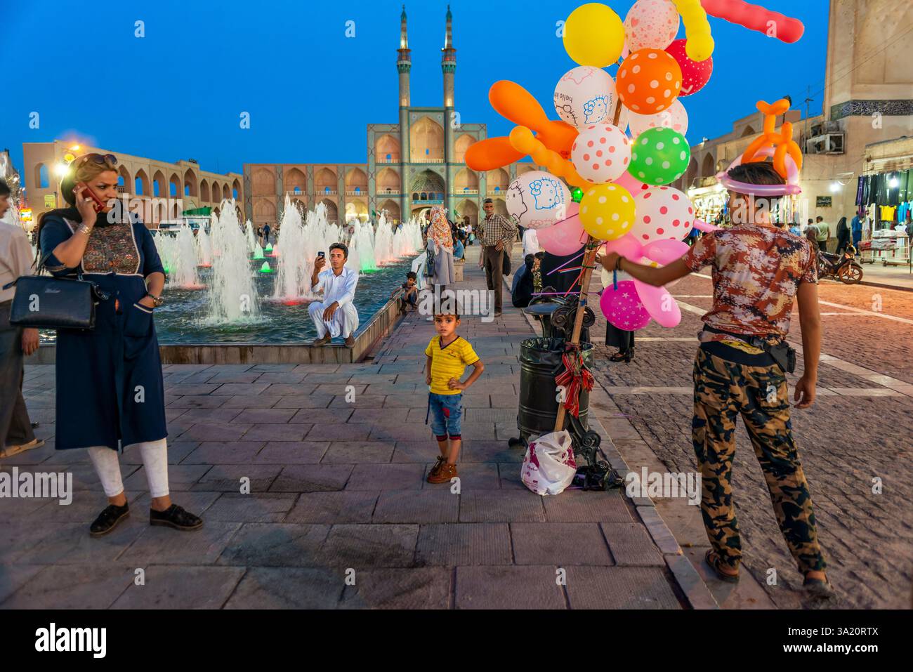 Balloon seller for children at sunset at sunset in Amir Chakhmag square ...