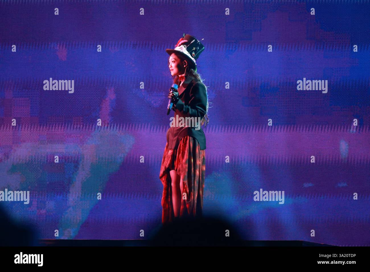 Chinese singer-songwriter Curley G attends an activity in Chengdu City ...