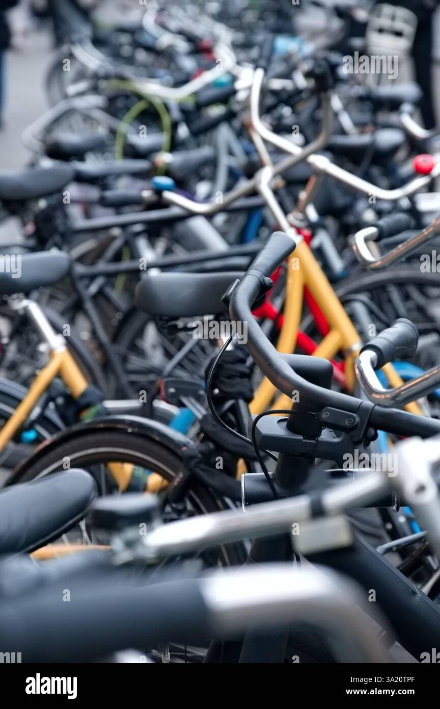 Bicycle parking area on sidewalk with a lot of colorful bicycles Stock ...
