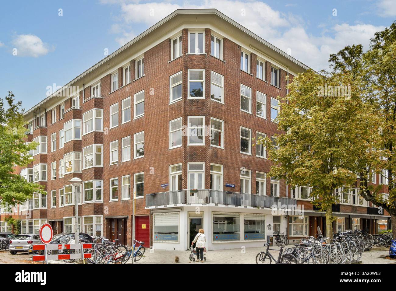 A striking example of modern urban architecture showcases large windows ...