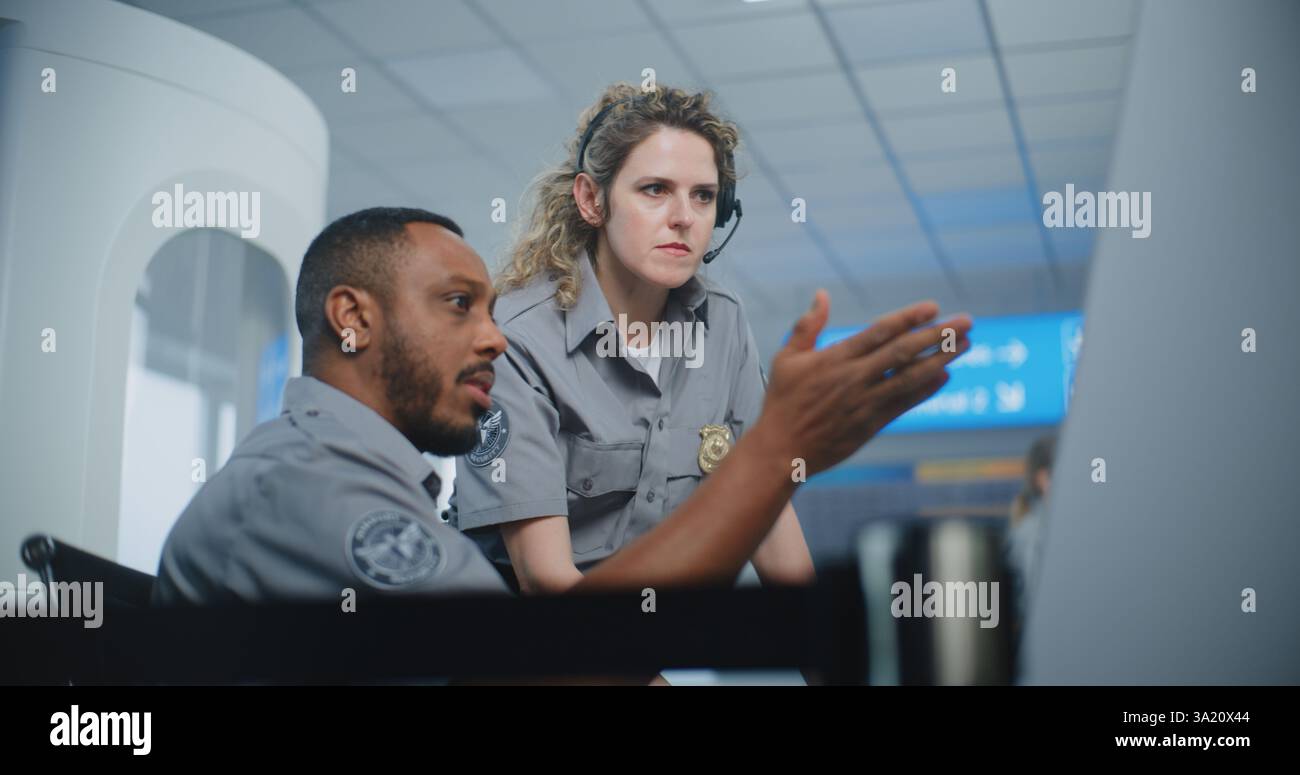 Airport Staff at Security Checkpoint: Two Multiethnic TSA Officers ...