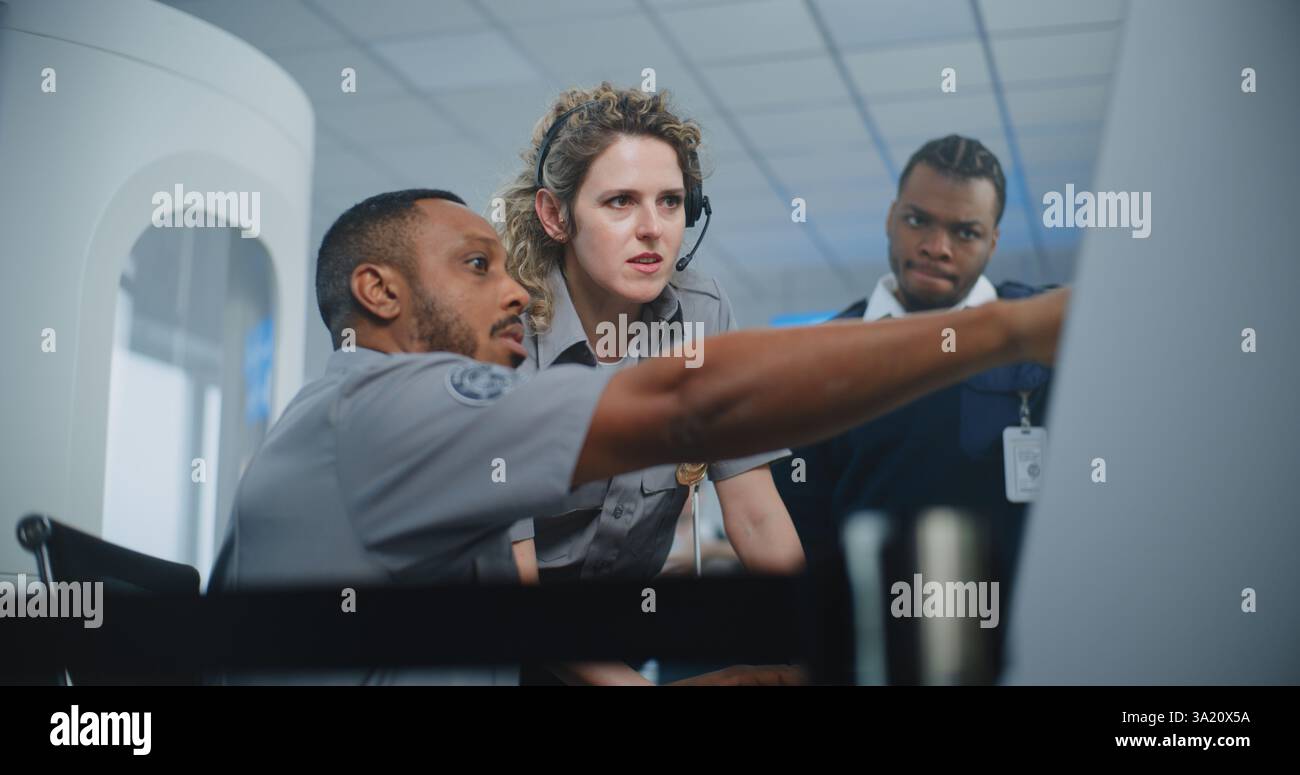 Airport Staff at Security Checkpoint: Two Multiethnic TSA Officers ...
