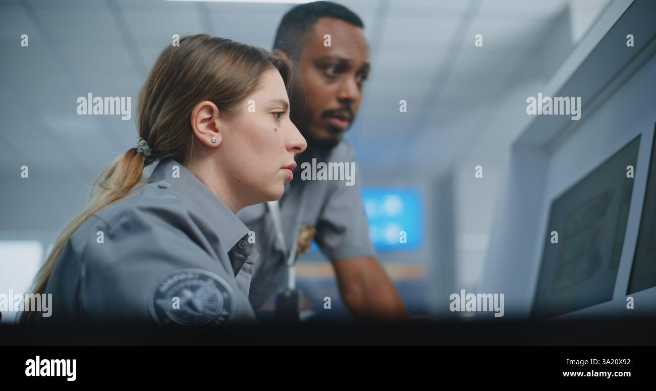 Airport Security Checkpoint: Two Diverse TSA Workers Monitoring Baggage ...
