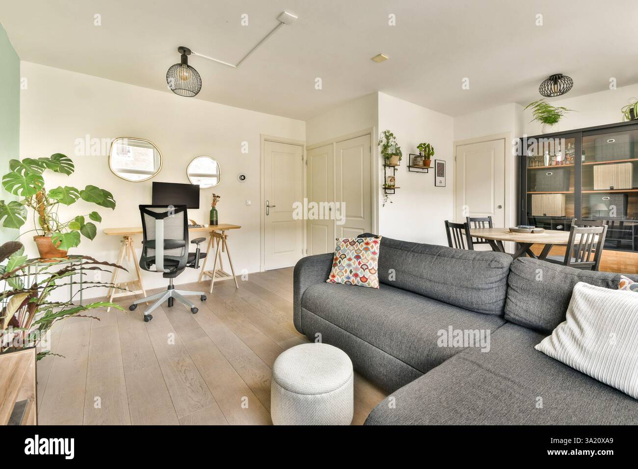 A stylish home office showcasing modern furniture, including a ...