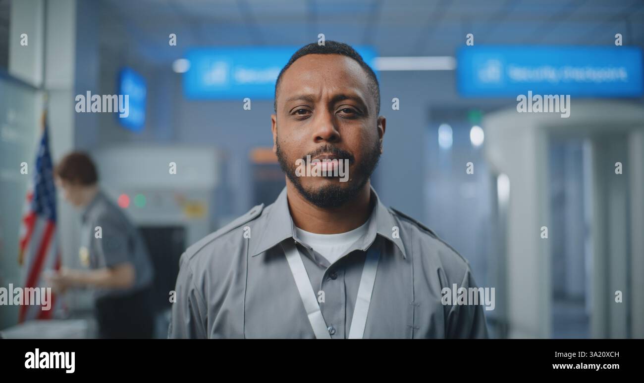 Airport Security Checkpoint: Portrait of African American TSA Officer ...