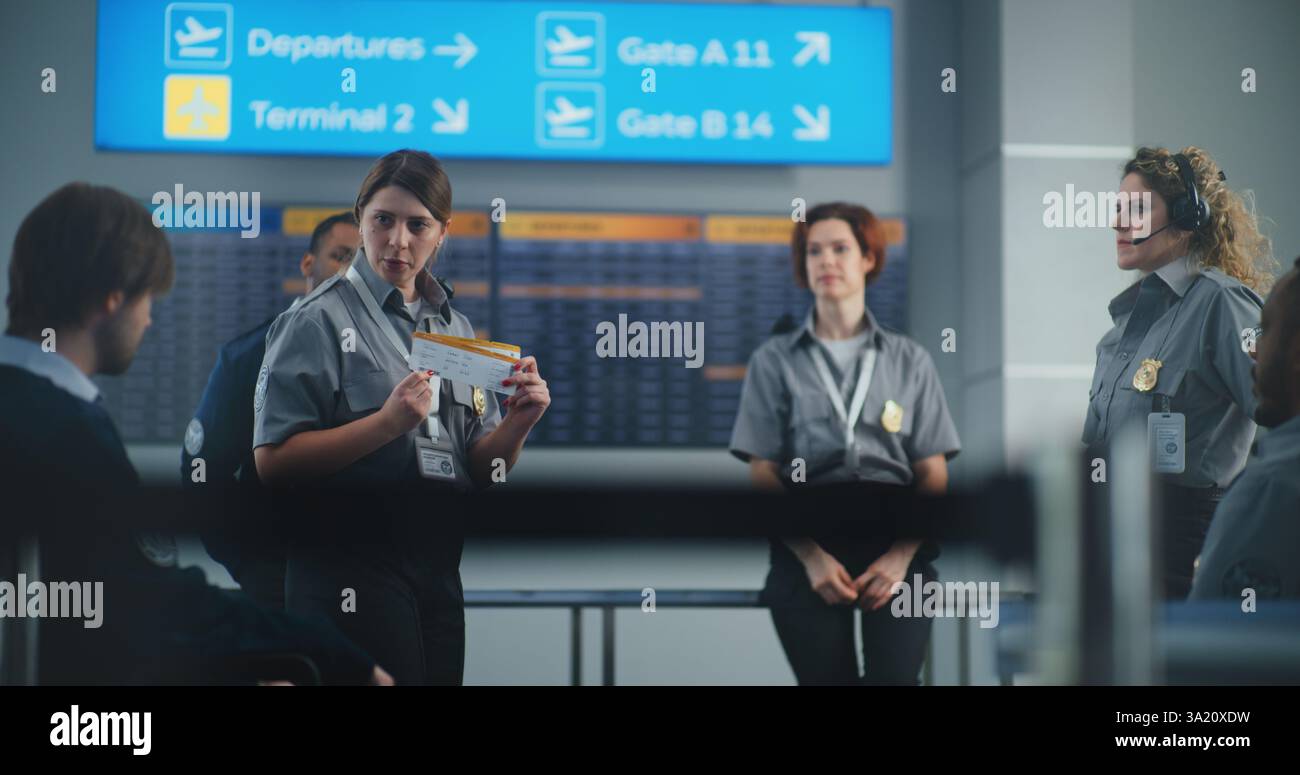 Airport Staff Training: Female TSA Officer Giving Instructions, Holding ...