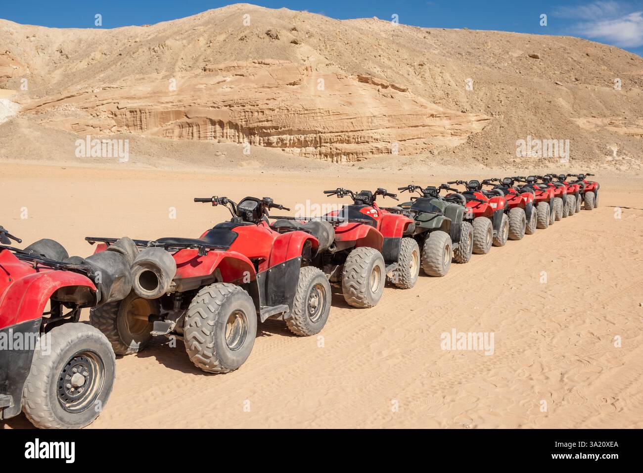 Quad motorbikes lined up ready for safari adventure in Sinai desert ...