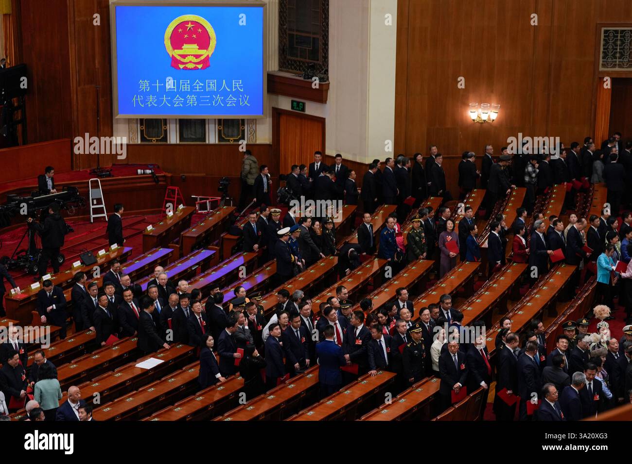 Delegates leave after the closing ceremony of the National People's ...