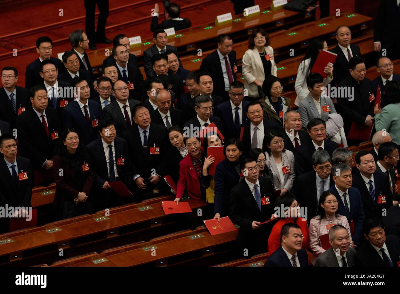 Delegates leave after the closing ceremony of the National People's ...