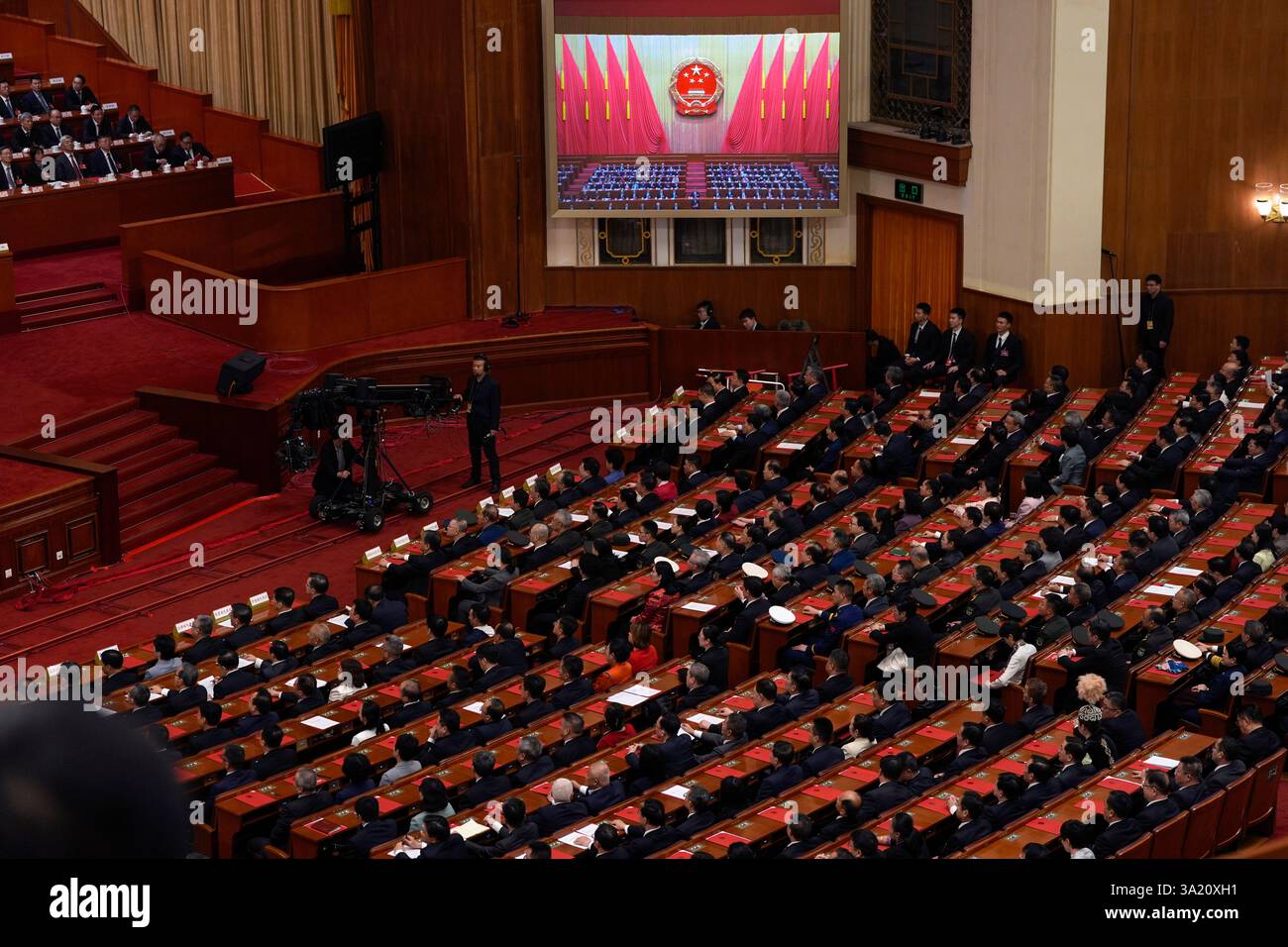 Delegates attend the closing ceremony of the National People's Congress ...