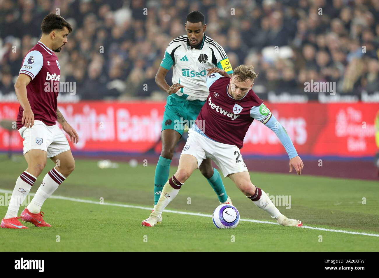 London, UK. 10th Mar, 2025. Jarrod Bowen (WHU) Alexander Isak (NU) at ...