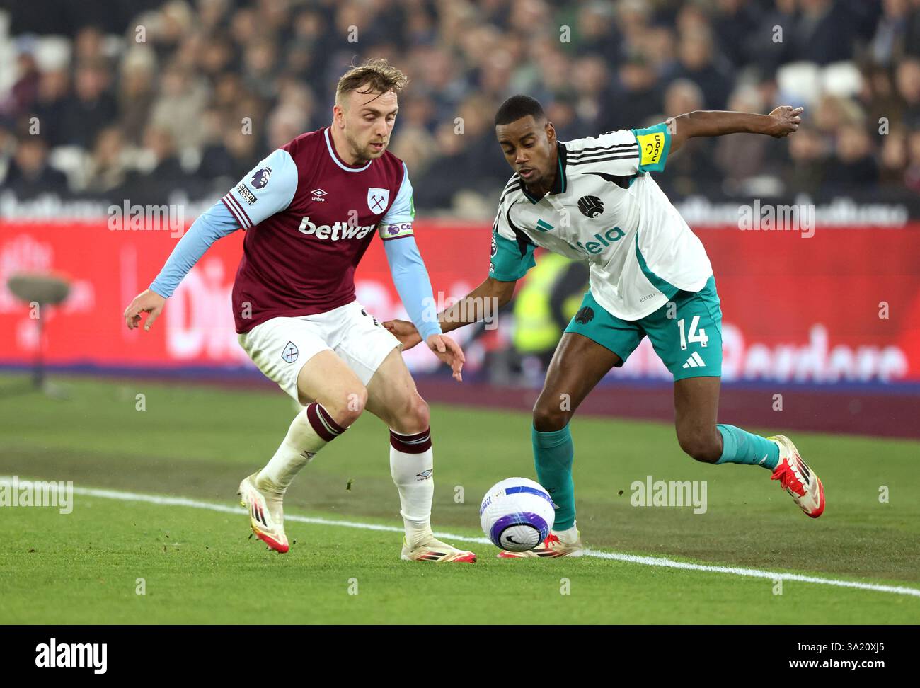 London, UK. 10th Mar, 2025. Jarrod Bowen (WHU) Alexander Isak (NU) at ...