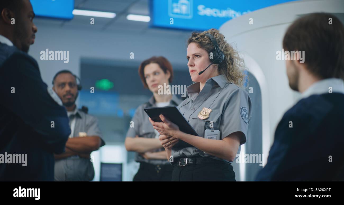 Airport Security System: Female TSA Officer with Tablet Computer ...