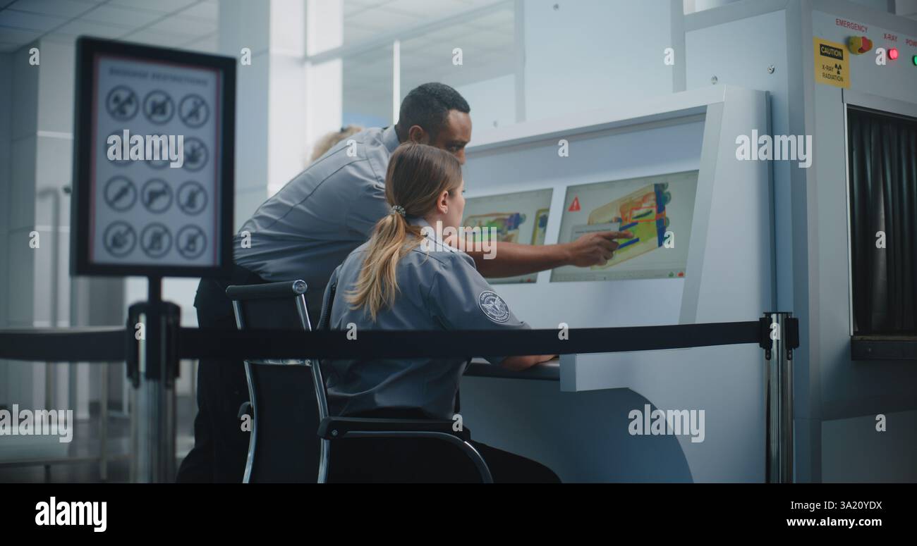 Airport Security Checkpoint: Two Diverse TSA Workers Controlling X-ray ...