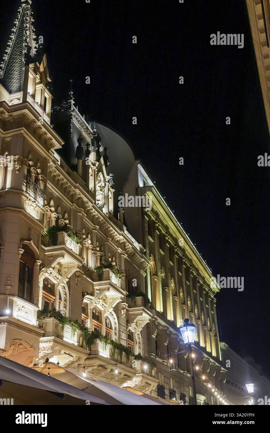 Stunning historic buildings are beautifully lit at night in Bucharest, Romania, highlighting ...