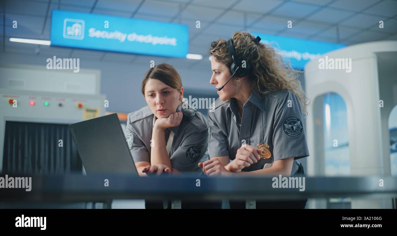 Airport Security Checkpoint: Two Female TSA Officers in Headset Using ...