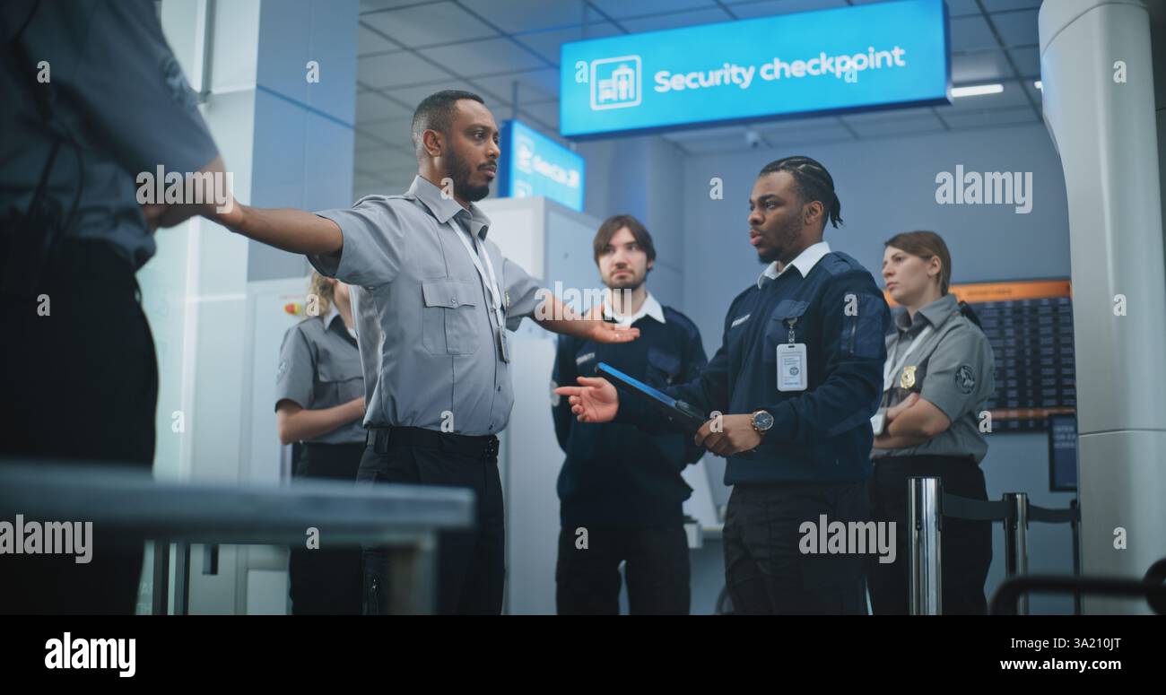 Airport Staff Training: African American Security Officer Giving ...