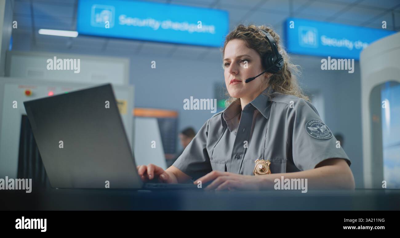 Airport Security Checkpoint: Female TSA Officer Wearing Headset Works ...