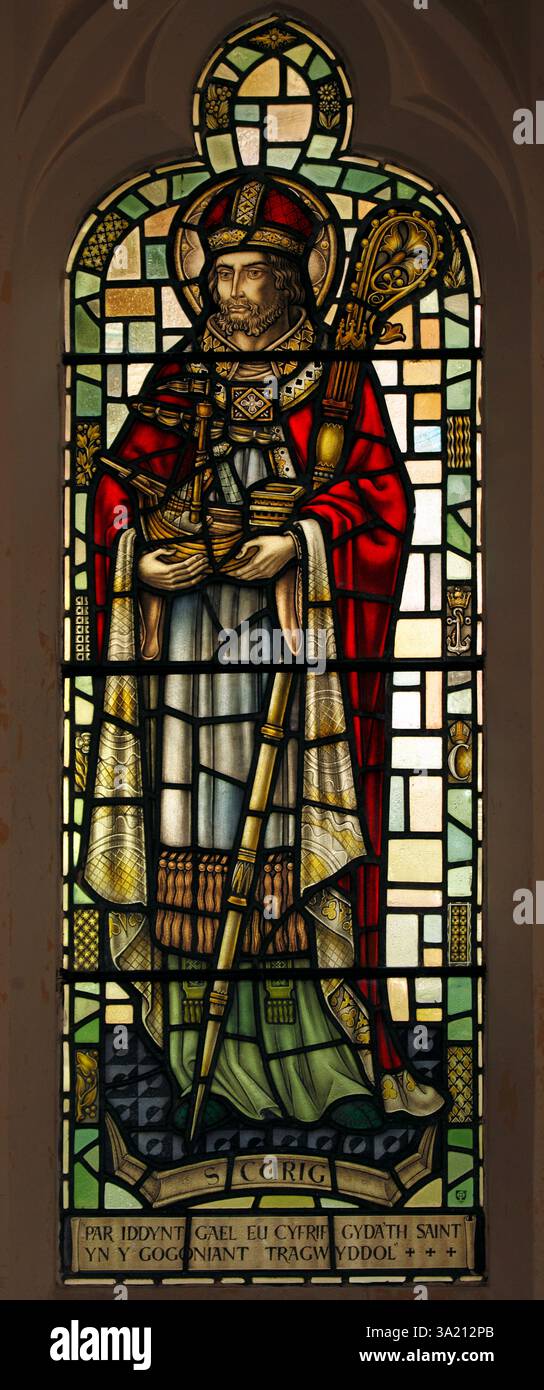 St Curig, depicted in a stained glass window in Llangrannog church ...